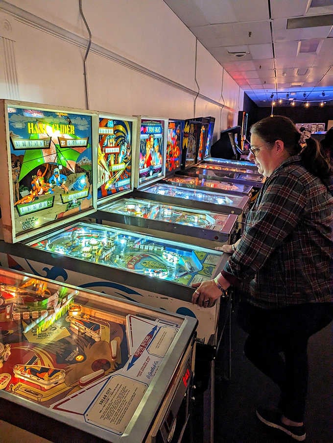 Focused concentration on a classic machine, because pinball demands respect and quick reflexes from every generation.