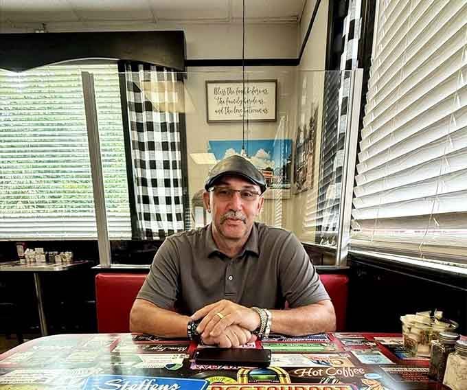 The classic diner booth where you can watch the magic happen while sipping coffee that never runs dry.