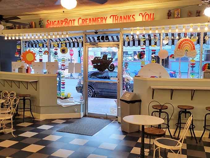 Colorful window decorations promise the sweetness waiting inside, and they don't lie about it.