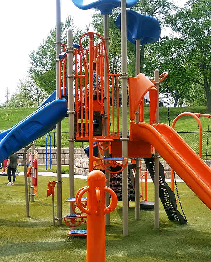 Modern playground equipment that somehow doesn't ruin the fairy tale vibe, which is honestly impressive.