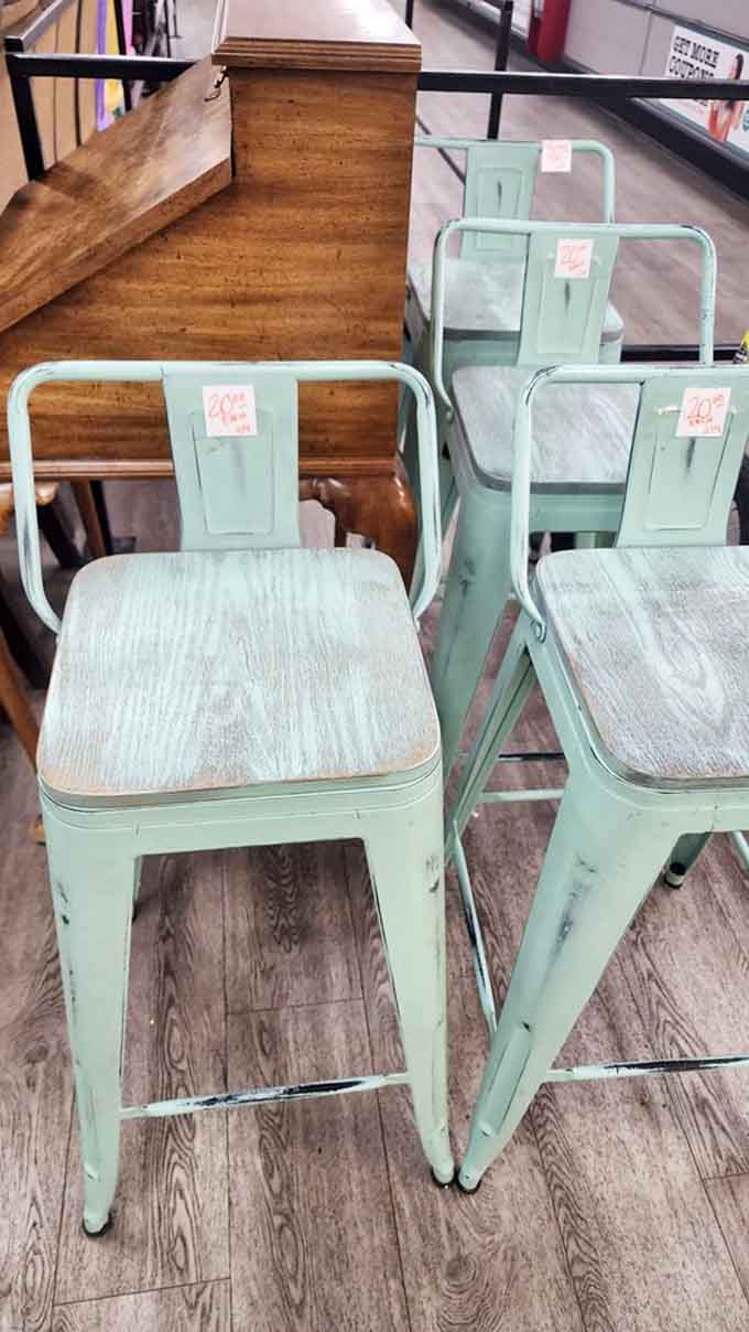 Mint-green vintage chairs whisper stories of diners past, ready to add character to your kitchen corner.