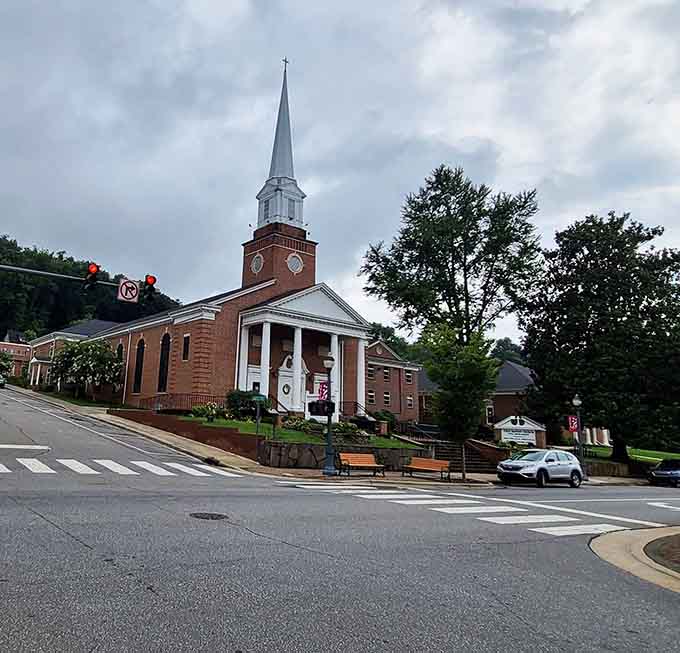 First Baptist Church's steeple reaches skyward like it's trying to get closer to those mountain peaks.