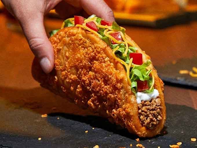 A Crunchy Taco Supreme in all its glory, looking exactly like the menu picture for once.