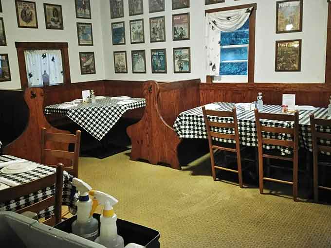 Wooden booths, framed memories on the walls, and an atmosphere that whispers "stay awhile, relax, enjoy."