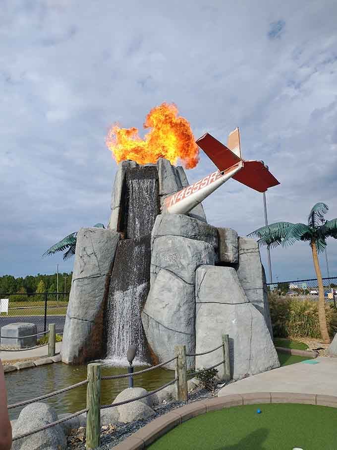 A fire-breathing volcano guards the mini golf course because regular obstacles are for amateurs and quitters.