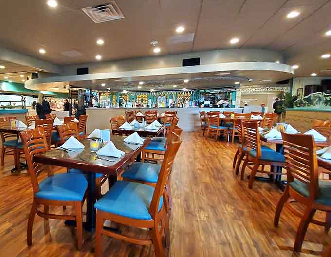 The spacious buffet area with aquarium accents creates a relaxed vibe perfect for serious eating without feeling rushed.