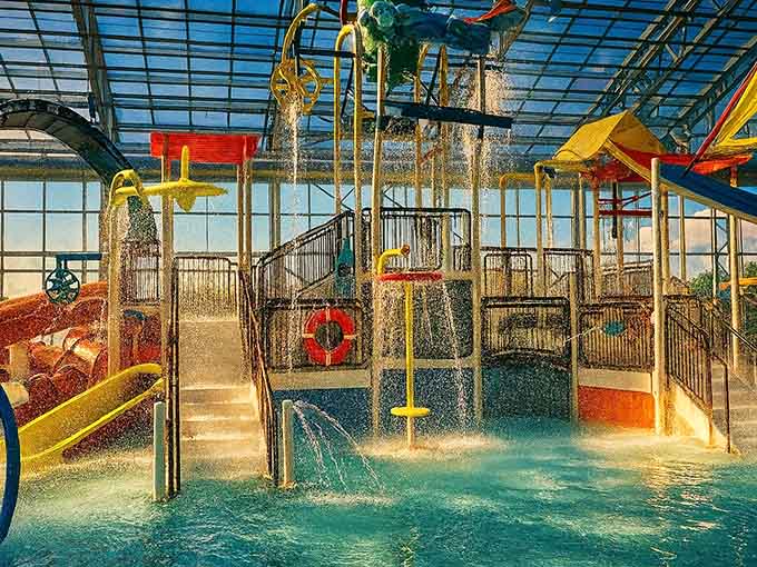 Multi-level water features and slides create a vertical playground that maximizes every square foot of fun.