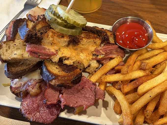The corned beef Reuben arrives stacked high with all the fixings, proving that some sandwiches deserve their legendary status.