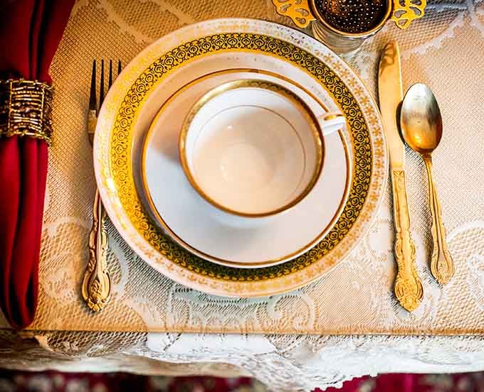 The formal place settings remind you that some traditions are worth preserving and celebrating properly.