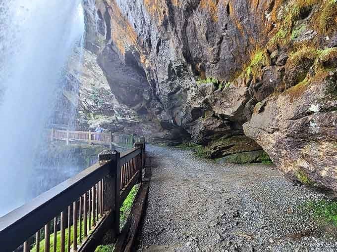 The walkway behind the falls: where getting misted feels like nature's own spa treatment, hold the cucumber slices.