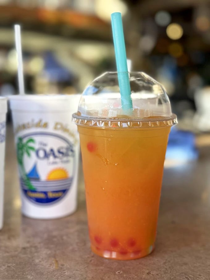 That amber boba drink glowing in the Texas sun looks less like a beverage and more like liquid happiness.