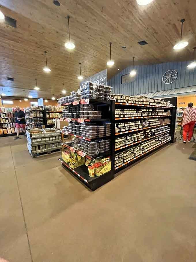 Rows of local jams, jellies, and preserves stacked high enough to make any pantry jealous of your shopping haul.