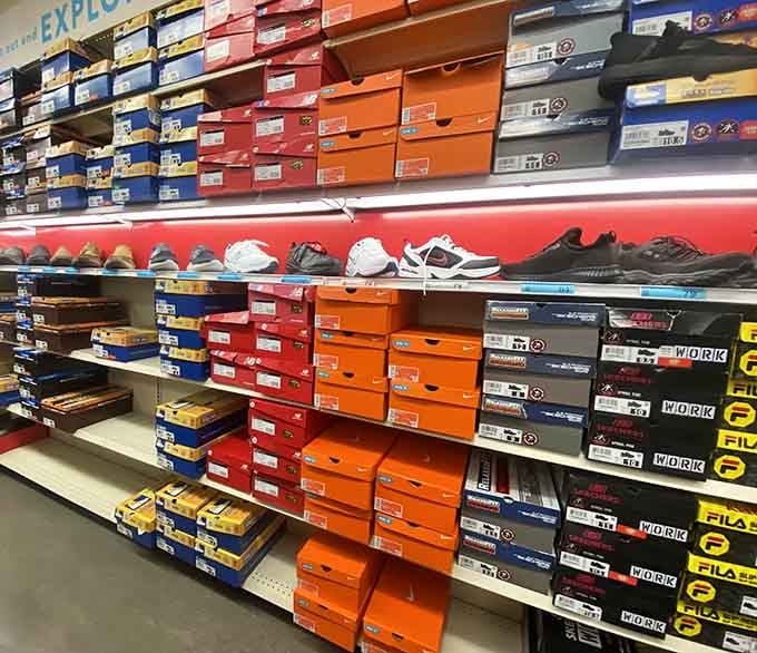 Shoe walls stacked high with colorful boxes, like a sneakerhead's version of winning the lottery.