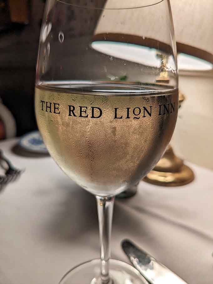 Even the wine glasses know they're part of something special, proudly displaying the Red Lion Inn name with style.