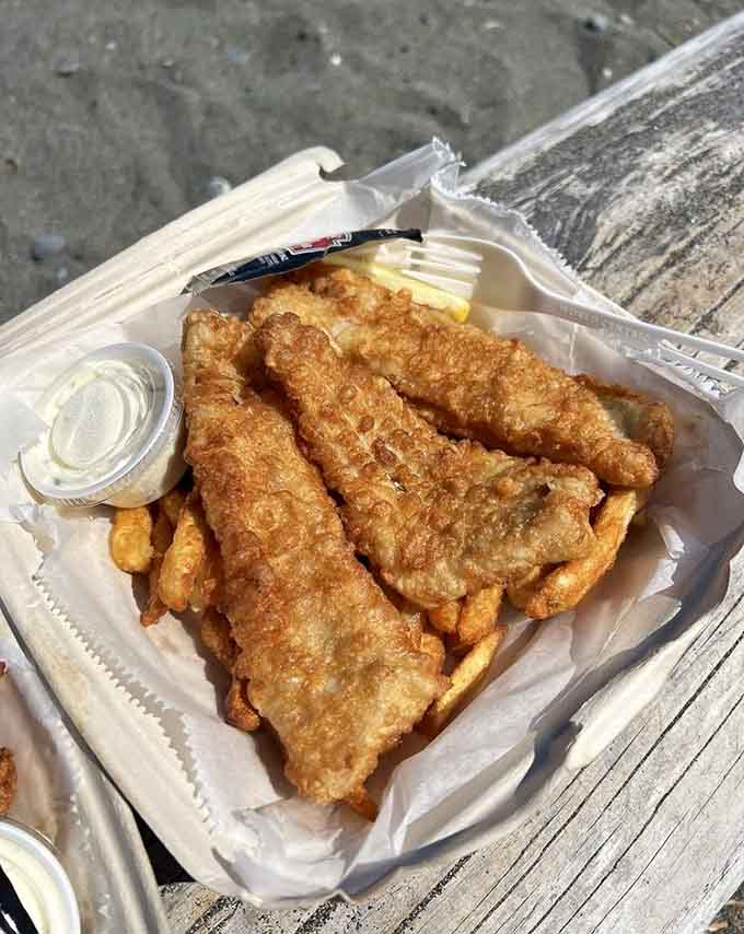 Fish and chips done right: flaky inside, crispy outside, exactly how your taste buds have been dreaming.