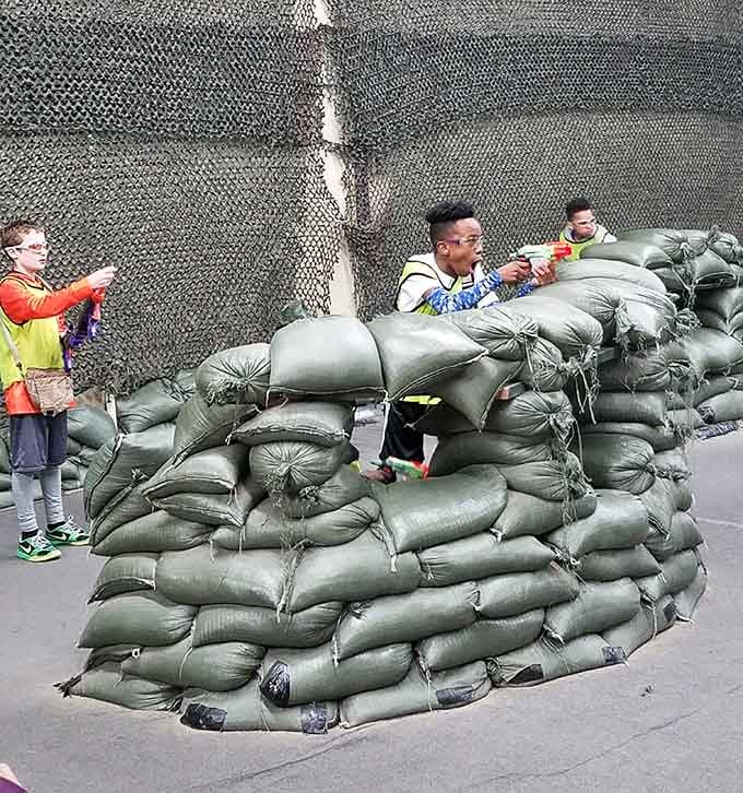 Taking cover like your life depends on it, because in this moment, your pride absolutely does.