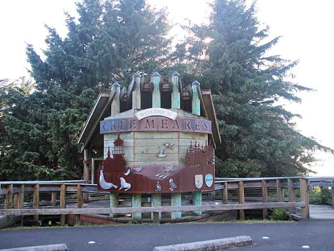 Welcome to Cape Meares, where the scenery lives up to every promise this cheerful sign makes.