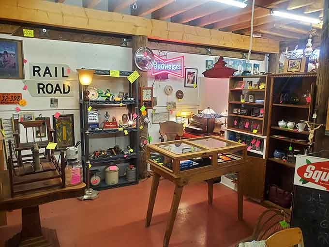 Railroad signs, pink cabinets, and organized chaos: the visual definition of "one person's trash is another's treasure."