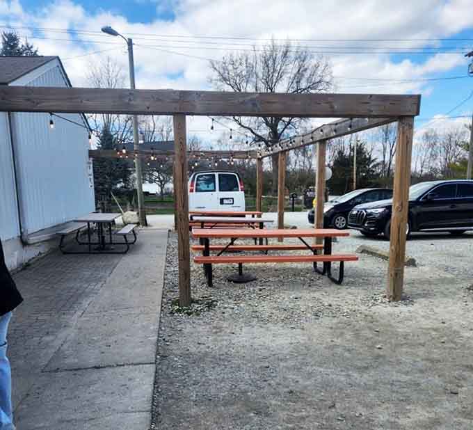 Outdoor seating with string lights means you can enjoy your barbecue under the stars like a civilized carnivore.