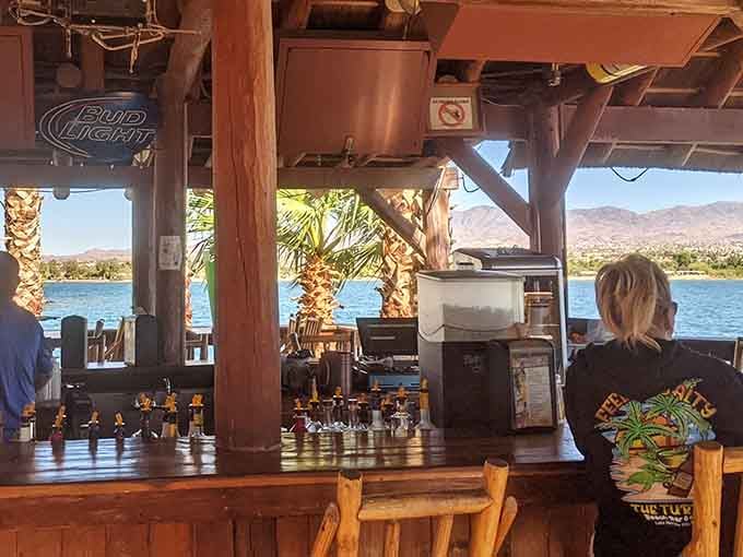 The outdoor bar area frames Lake Havasu like nature's own picture window, boats included free.