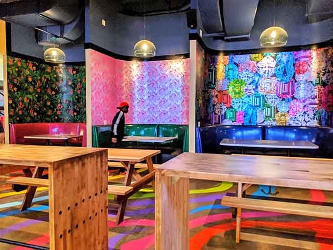 Picnic tables meet ping pong in a space where the only rule is having fun while you eat well.