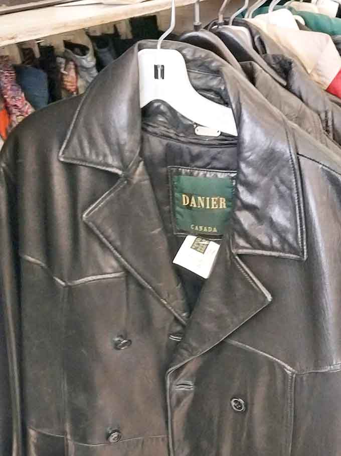 A leather jacket with more character than most Hollywood leading men, just hanging there waiting for adoption.