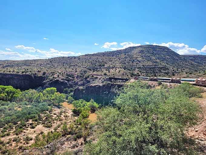 Mountains frame the valley where the Verde River winds through wilderness accessible only by this train.
