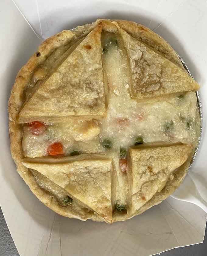 A chicken pot pie that looks like someone's beloved grandmother made it with extra love this morning.