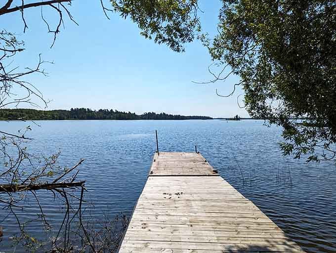 This weathered dock stretches toward distant islands, beckoning you to leave solid ground behind for a while.
