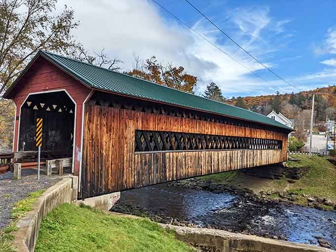The weathered wood tells stories of countless crossings while the green roof keeps everything protected from the elements.