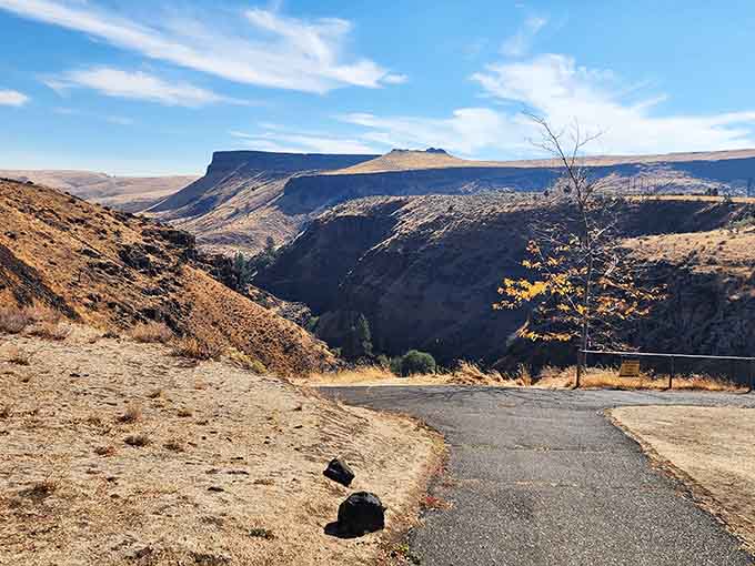 The approach road winds through sagebrush country, building anticipation for the watery surprise waiting ahead.