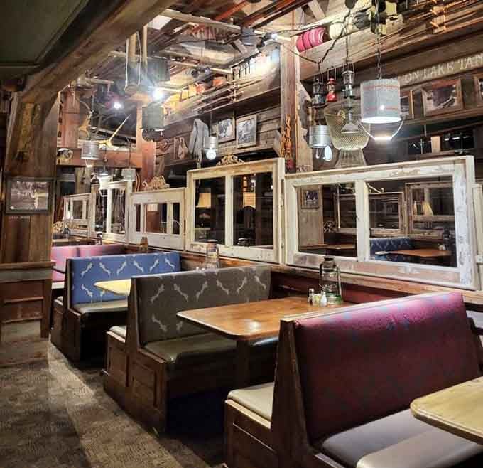Booth seating surrounded by fishing memorabilia makes you feel like you're dining in someone's very well-decorated lake house.