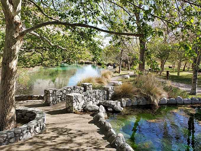 Stone bridges over trickling streams create a landscape that looks borrowed from a Japanese garden in the Mojave.