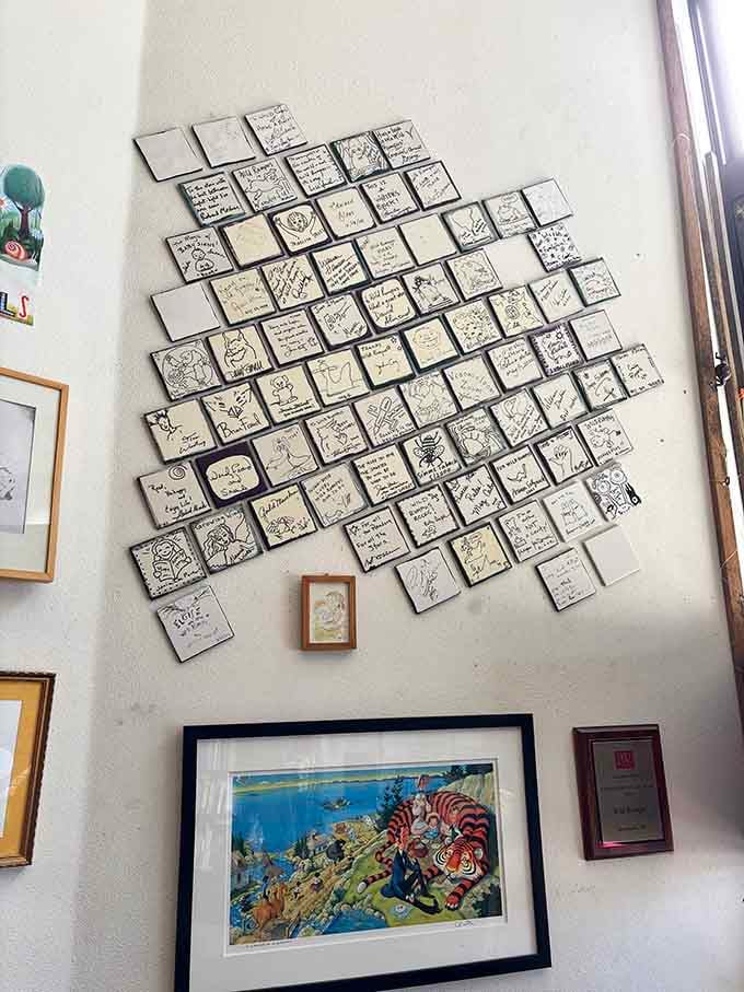 Author signatures arranged like a quilt celebrate the writers who've graced this beloved literary haven over the years.