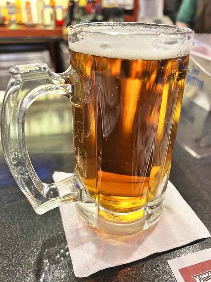 A frosty Yuengling Lager on draft, because sometimes your burger needs a proper Pennsylvania companion at the table.