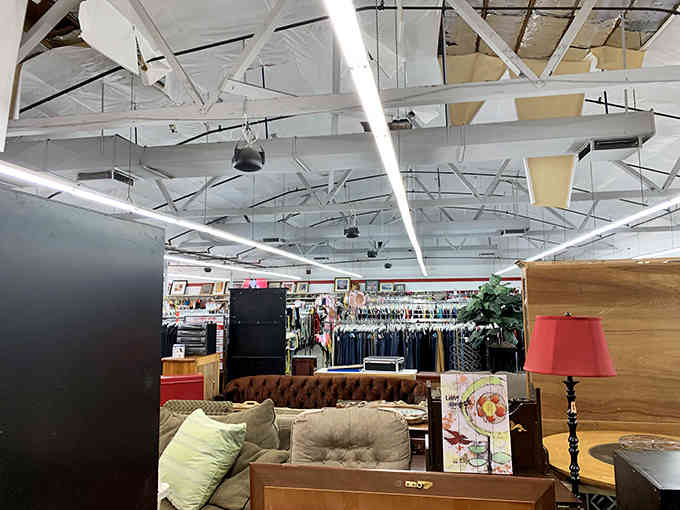 High ceilings and open spaces create a warehouse atmosphere where hunting for deals feels like a proper expedition.