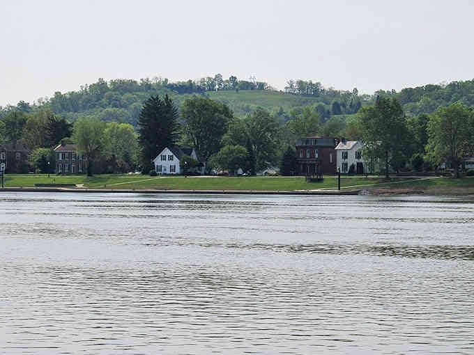 Historic homes dot the riverbank, creating a postcard scene that's remained essentially unchanged since your grandparents' courting days.