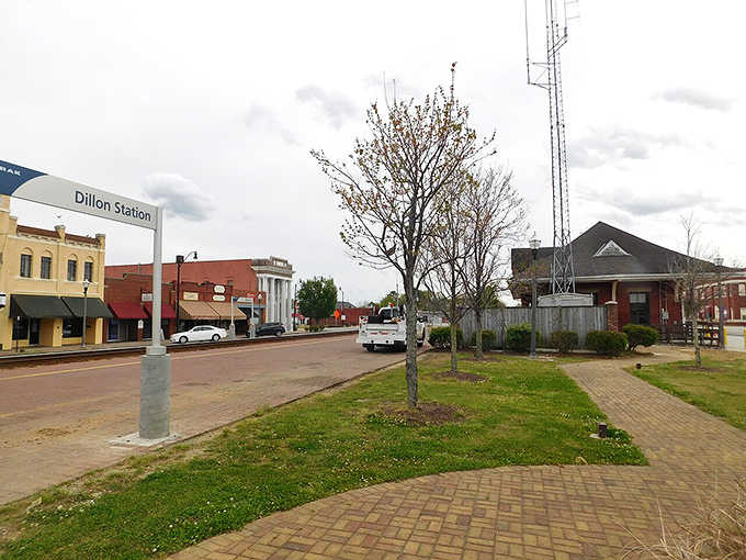 The town center spreads out with brick walkways and green spaces, perfect for a leisurely stroll anytime.