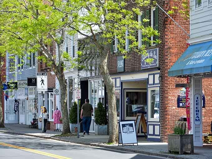 Those blue awnings catch your eye from blocks away, promising coastal charm and treasures worth discovering inside.