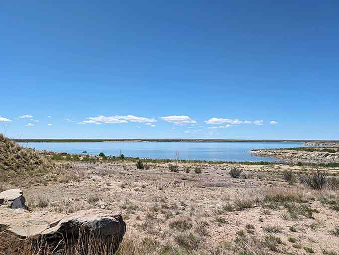 That impressive dam standing strong across the horizon represents human ingenuity meeting nature's raw power head-on.