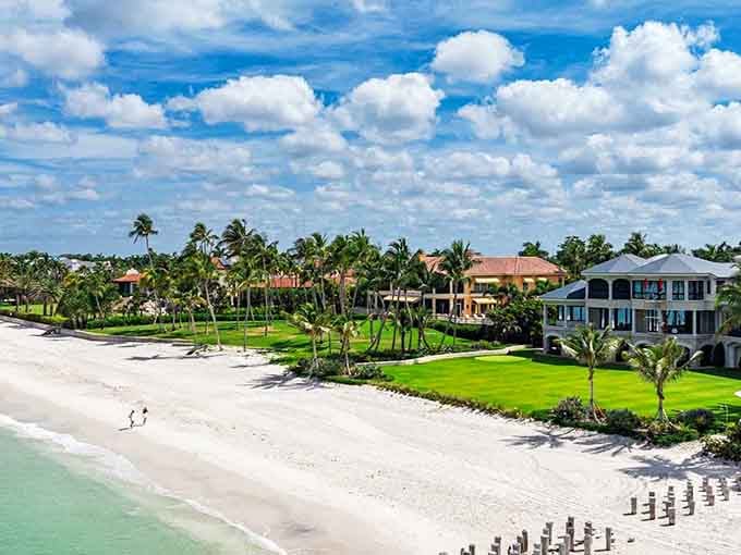 Beachfront living reaches new heights where manicured lawns roll right down to sugar-sand shores under picture-perfect skies.