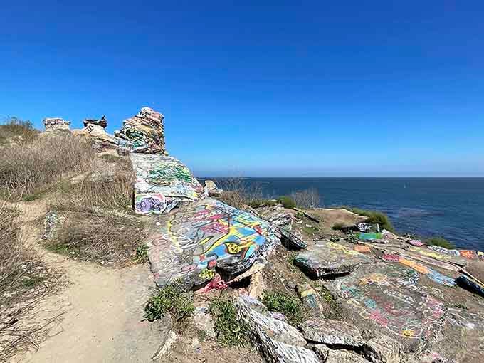 Graffiti-covered concrete ruins tumble toward the Pacific, where a neighborhood's slide into the sea created accidental urban art.