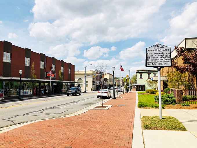 The historic marker tells stories of the past while brick sidewalks lead you toward an affordable, comfortable future here.