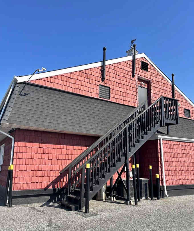 Those pink shingles and that dramatic staircase lead to an upstairs dining room where waterfront views meet exceptional seafood.