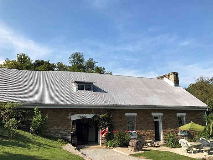 Stone walls and a tin roof give this riverside building the kind of character that modern construction just can't replicate.