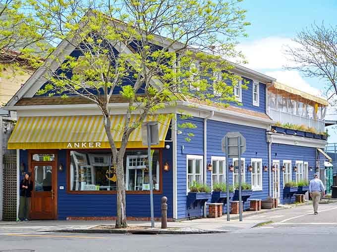 Greenport's nautical charm shines through with its blue-painted buildings and relaxed coastal vibe that makes every visit feel like a mini vacation.