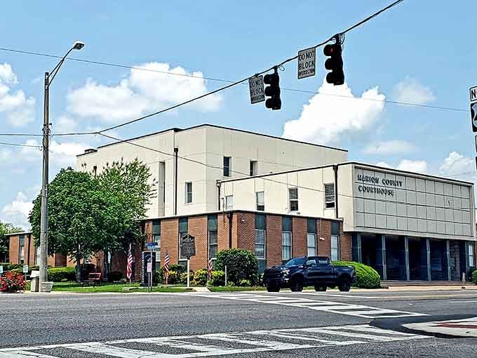 The county courthouse complex anchors downtown with practical architecture that serves the community's administrative needs efficiently and proudly.