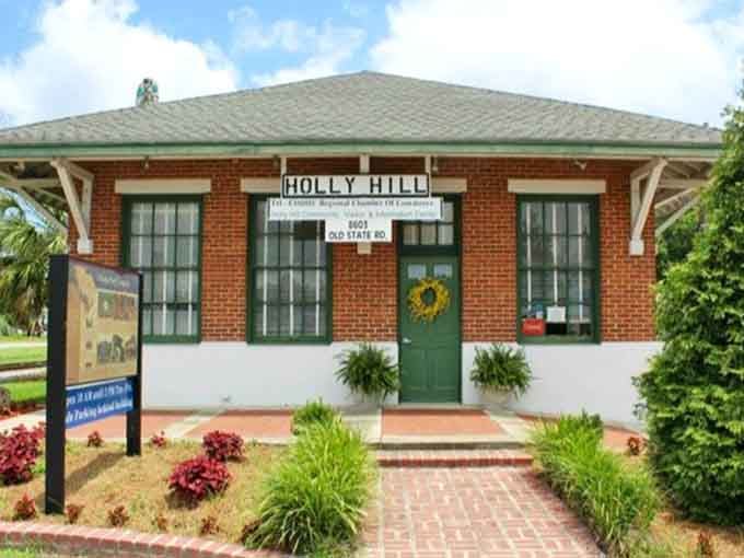 Holly Hill's depot sits picture-perfect with its brick steps and green door, ready for visitors who appreciate authentic history.