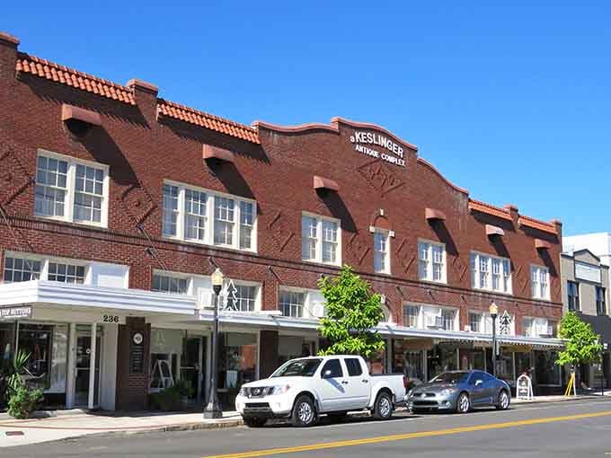 Spanish-style arches and practical storefronts show you can have architectural beauty on a sensible budget, finally.