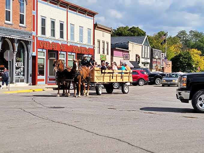 Horse-drawn wagon rides down main street prove some towns refuse to let the past become just a memory.